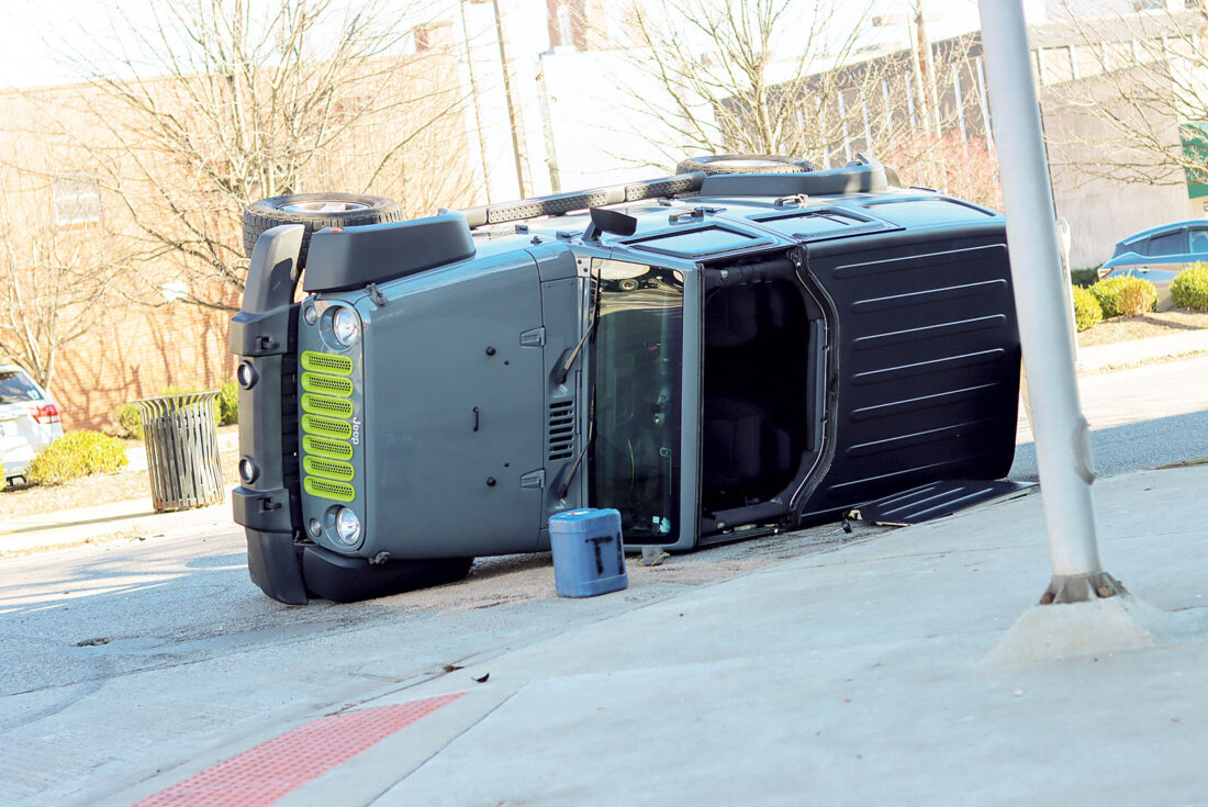 Vehicle flips in downtown Parkersburg crash | News, Sports, Jobs - News ...
